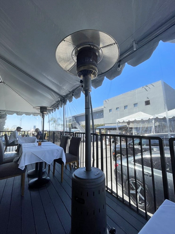 The outdoor patio offers al fresco dining with heat lamps standing guard against the evening chill – because great views shouldn't require a sweater.