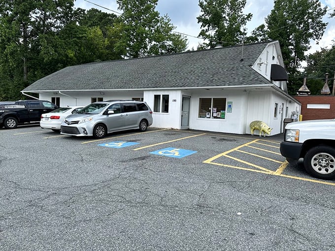 The parking lot tells the story—local plates mixed with out-of-state visitors who've made the pilgrimage to one of North Carolina's barbecue holy sites.