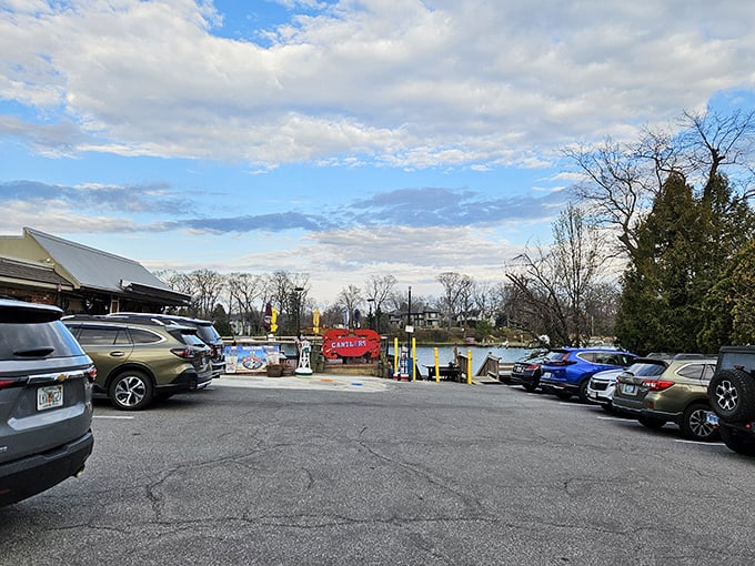The view from the parking lot hints at the waterfront experience to come—boats, blue skies, and the promise of seafood straight from the source.