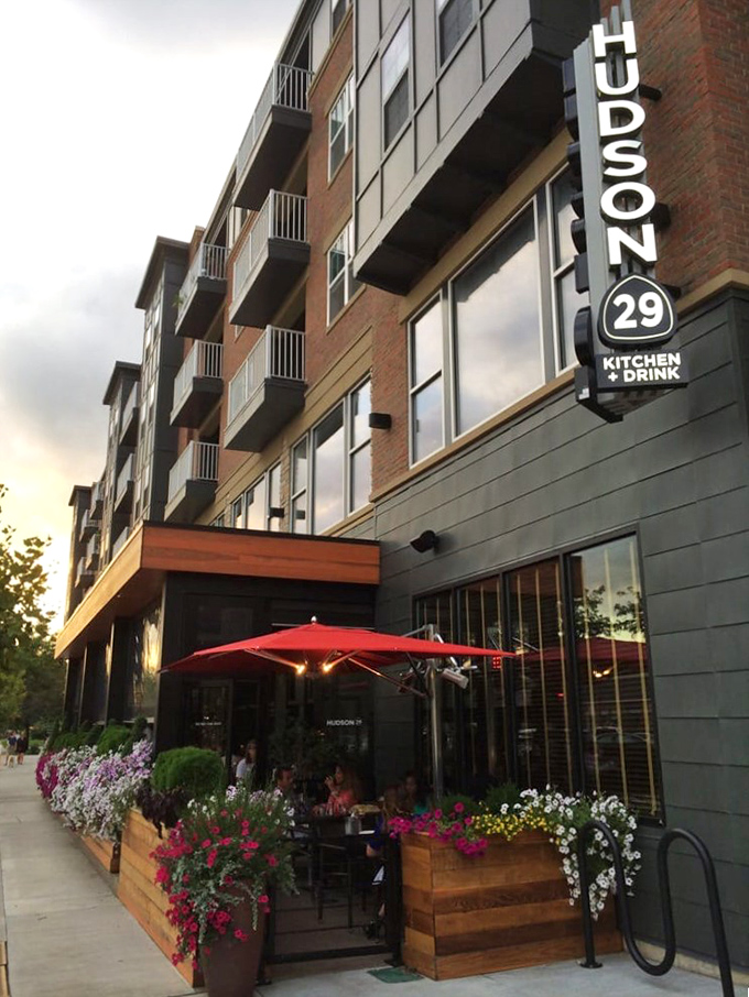 The patio blooms with colorful flowers and even more colorful conversation—outdoor dining that makes Ohio summers feel like a European holiday.