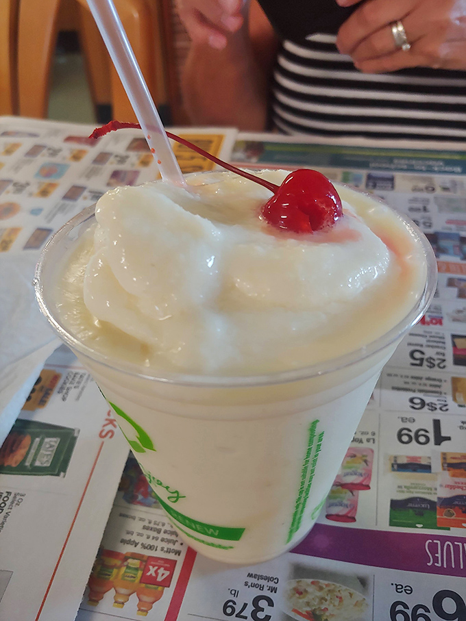 A classic milkshake topped with a cherry – because some traditions never go out of style, especially the delicious ones.