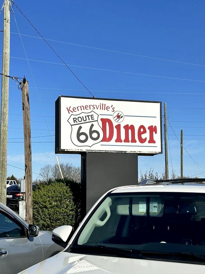 A simple sign that promises big flavors, marking the spot where hungry travelers become satisfied customers.