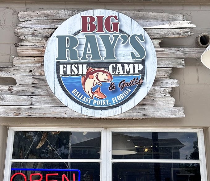 The sign says it all – this isn't just a restaurant, it's a "Fish Camp & Grille." Part dining experience, part homage to Florida's fishing heritage.