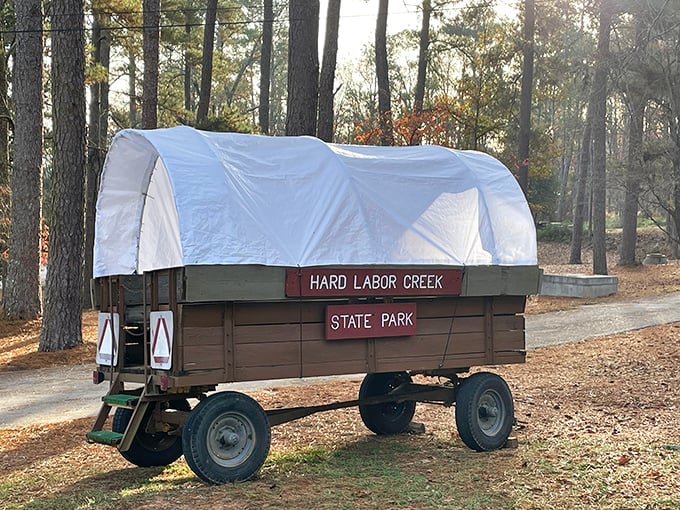 This charming covered wagon sign doesn't just mark Hard Labor Creek—it time-travels you back to when "hard labor" meant something entirely different from office work.