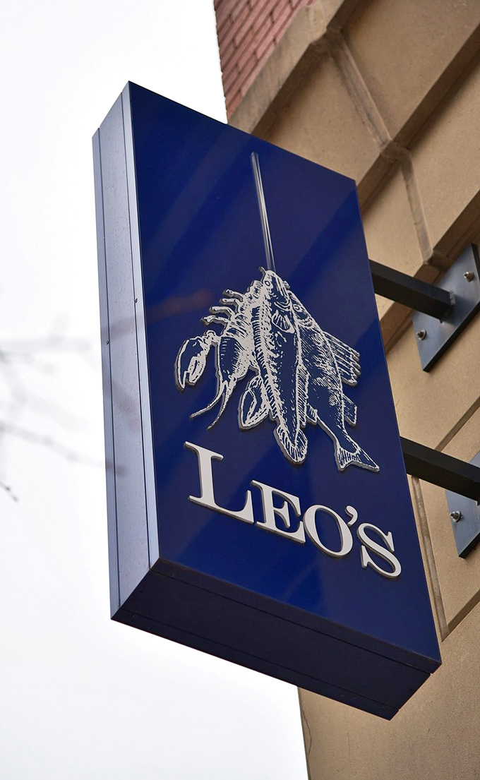 Leo's iconic blue sign with its seafood illustration—like a North Star for hungry navigators in downtown Grand Rapids.