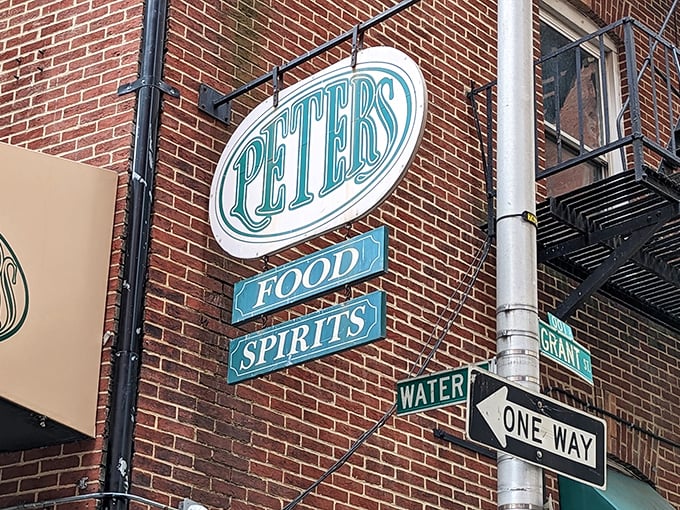 That iconic oval sign serves as a beacon for the hungry and thirsty – a simple promise of good food and spirits awaiting inside. 