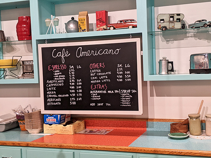 The chalkboard menu at Cafe Americano doesn't just list coffee—it promises transformation, one carefully crafted cup at a time.