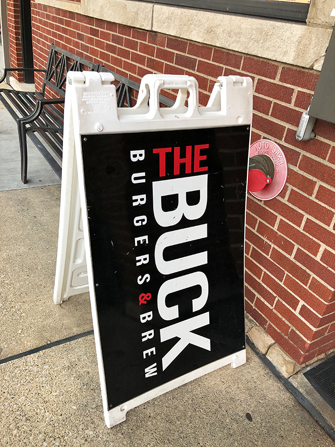 This sidewalk sign doesn't just mark an entrance—it's your invitation to the best decision you'll make all day.
