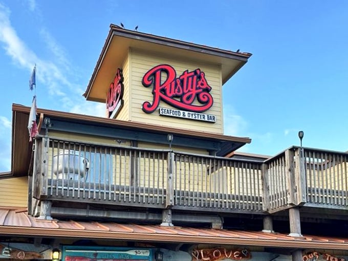 That iconic Rusty's sign against a perfect blue sky – a beacon for hungry travelers and locals alike. Some landmarks need no introduction.
