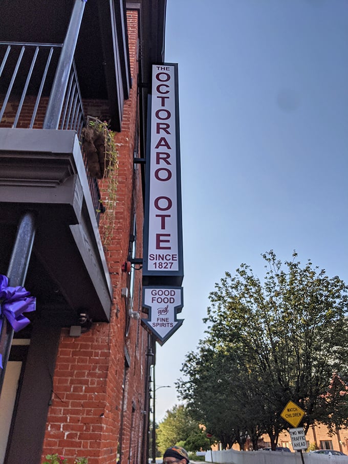 The vintage signage proudly declares "Good Food & Fine Spirits" – a promise this establishment has been keeping faithfully.
