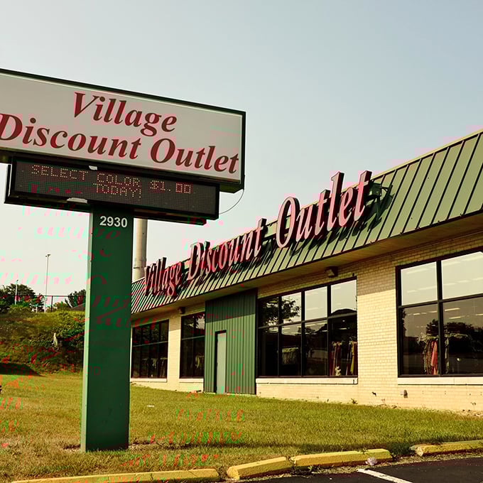 The iconic sign announces your arrival at thrifting nirvana. That electronic board below might as well read "Treasure Inside."