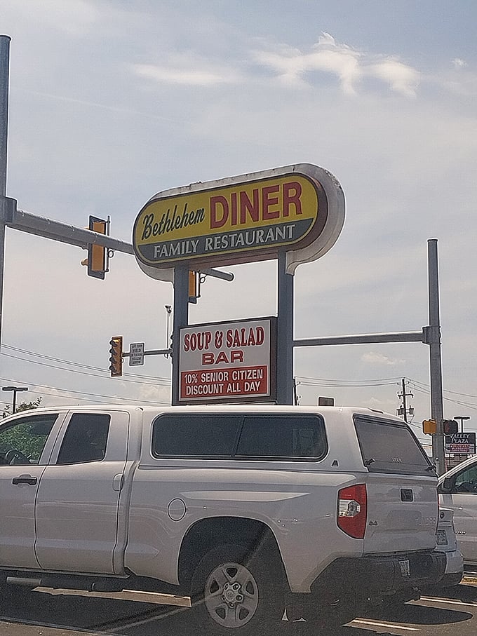 The roadside sign promises soup, salad, and senior discounts—a trifecta of diner perfection that's impossible to resist.