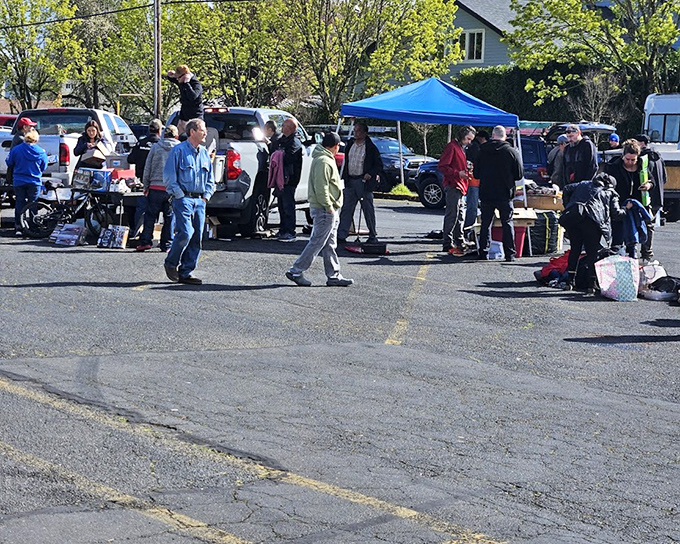 Spring sunshine bathes the market in possibility. Shoppers stroll between tables like museum-goers, except here, you can take the exhibits home.