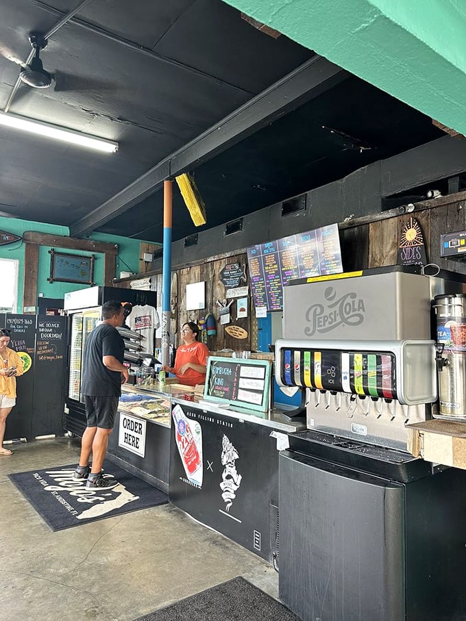 The heart of any great taco joint: friendly staff, eager customers, and a Pepsi machine that's seen its fair share of taco-induced thirst.