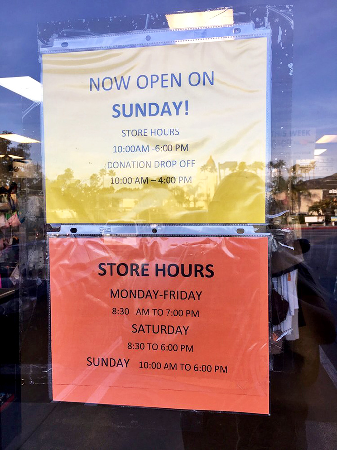 The store hours sign—your roadmap to bargain bliss. Sunday shopping is now an option for those post-brunch treasure hunting expeditions.