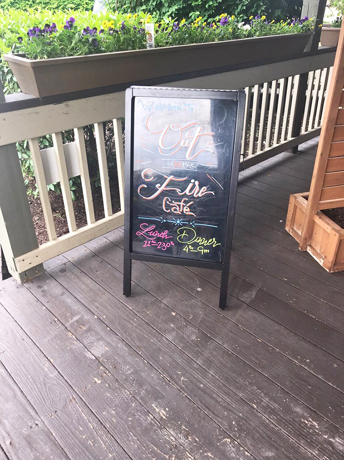 The chalkboard doesn't just list hours—it extends an invitation to step out of your routine and into a world where lunch and dinner are more than just meals.
