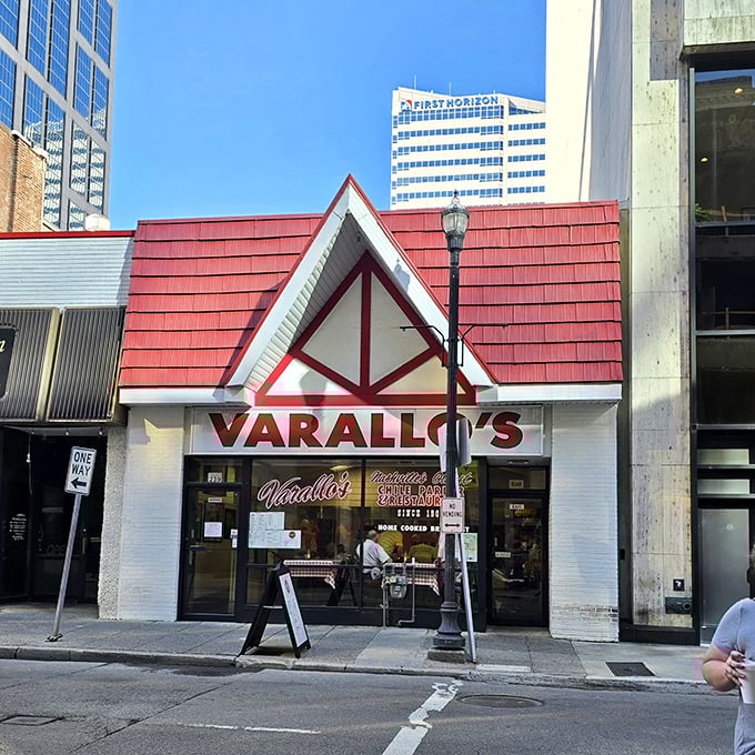 Morning light catches Varallo's distinctive red roof—a beacon of culinary consistency in a city that's constantly reinventing itself.