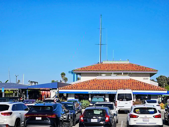 The building's Spanish tile roof hints at California's coastal heritage and timeless seafood traditions.
