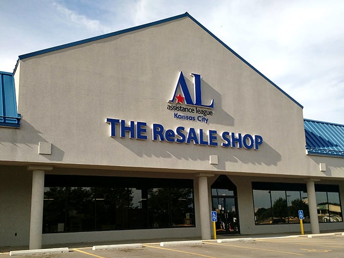 The Assistance League of Kansas City proudly announces its retail masterpiece. This isn't just a store sign—it's a beacon for bargain seekers.