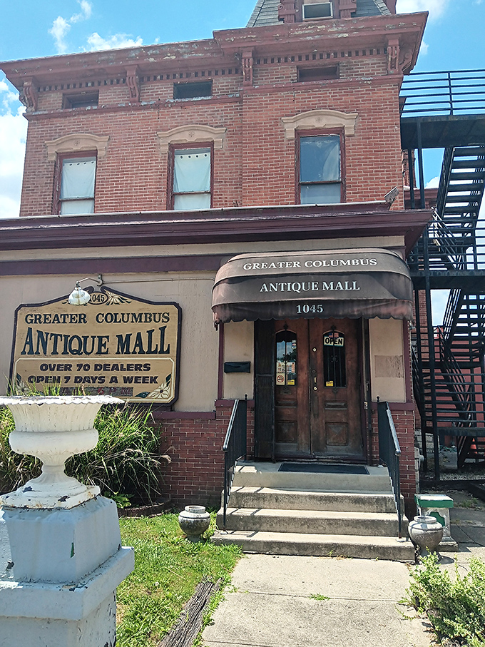 The welcoming entrance promises "OVER 70 DEALERS" inside this historic building—like a treasure map where X marks every spot.