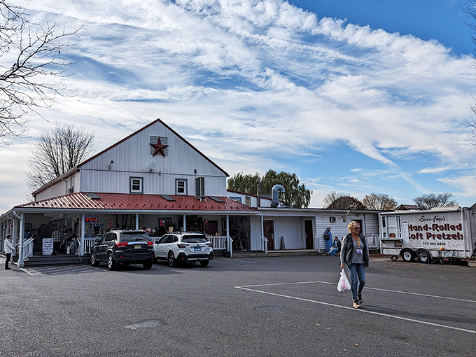 The classic storefront with its welcoming porch practically whispers, "Come on in, the cinnamon rolls are still warm." Who could resist?