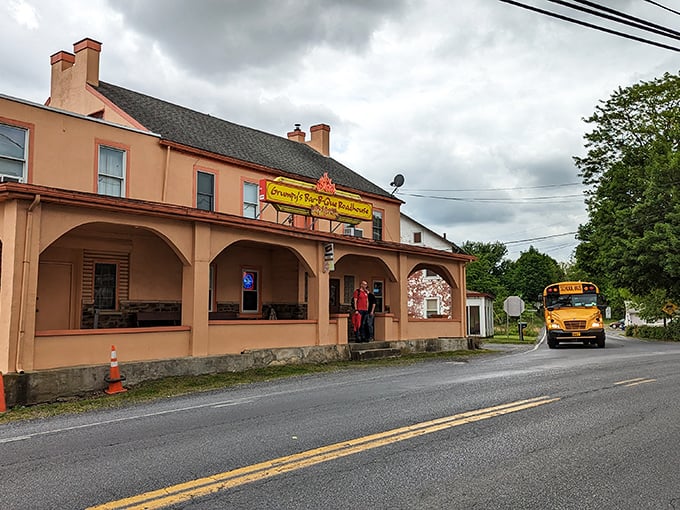 Even school buses slow down when passing Grumpy's—perhaps the driver catching a whiff of that irresistible smoke that promises delicious things inside.