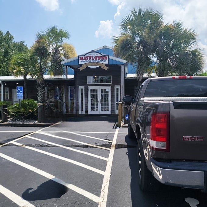 The Mayflower's inviting entrance promises seafood treasures within—those double doors might as well be labeled "Happiness This Way."
