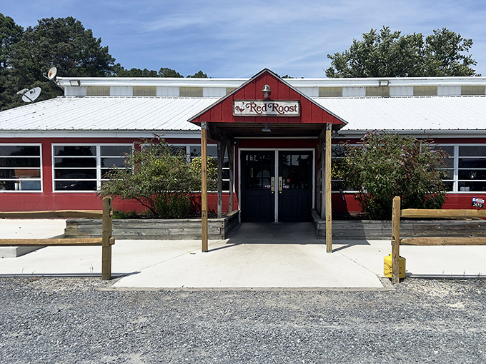 The Red Roost's iconic façade promises what lies within – unpretentious surroundings where the food, not the frills, takes center stage.