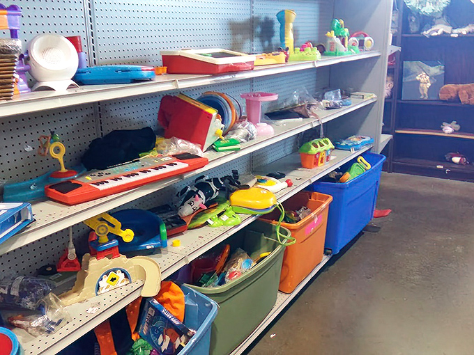 Toy section treasures span generations—from vintage Fisher Price to forgotten Happy Meal prizes, childhood nostalgia sold by the shelf.