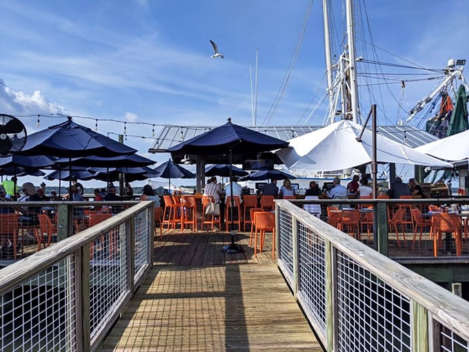 The walkway to seafood paradise—where seagulls provide the soundtrack and every table feels like the best seat in the house.