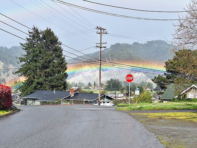 Rio Dell: A rainbow arcs over residential streets, nature's way of highlighting this hidden coastal gem often overshadowed by its neighbors.