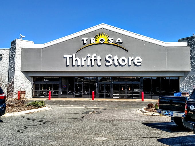 The TROSA Thrift Store stands like a cathedral of second chances, its bright sign beckoning bargain-hunters from across North Carolina.