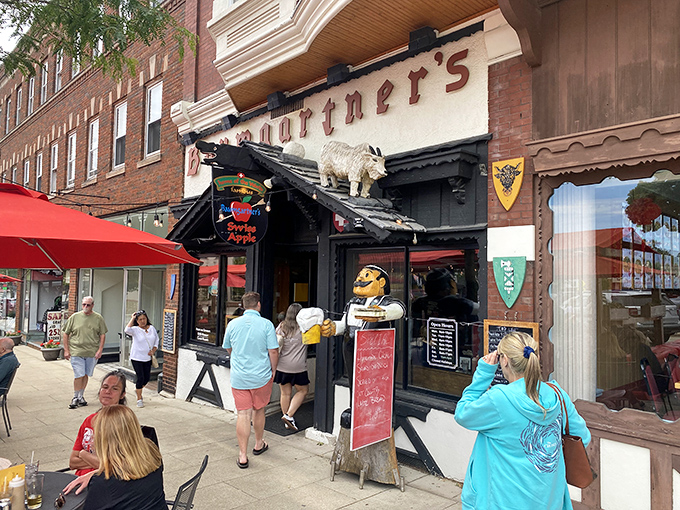 Baumgartner's iconic storefront beckons with its quirky charm. That goat on the roof isn't judging your cheese choices—he's envying them!