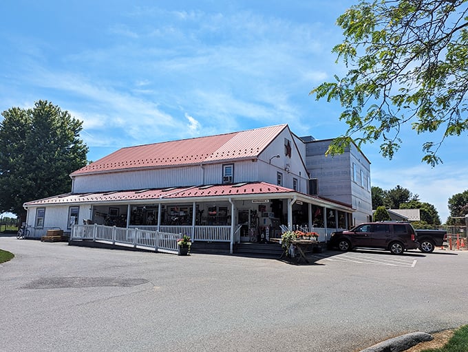 The classic red-roofed Bird in Hand Bakeshop stands like a delicious mirage in Amish country, promising sweet treasures inside.