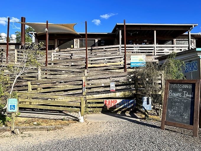 Rustic charm at its finest! Bowens Island's weathered wooden exterior promises seafood treasures for those brave enough to climb those steps.