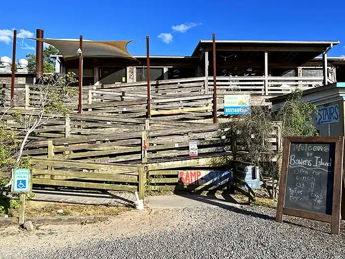 Rustic charm at its finest! Bowens Island's weathered wooden exterior promises seafood treasures for those brave enough to climb those steps.