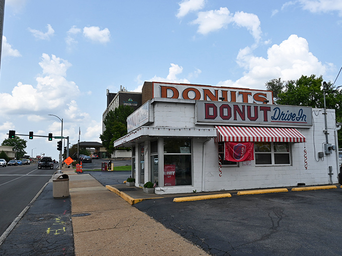 Classic Americana at its finest! This retro drive-in donut shop looks like it's been serving sweet memories since Elvis was on the radio.
