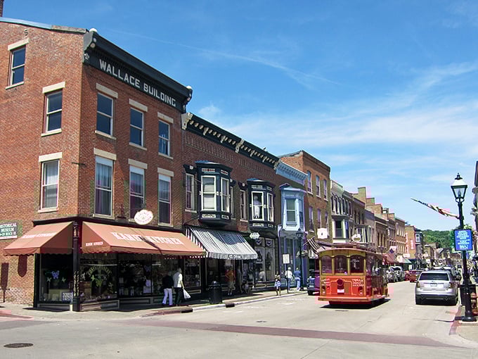 A trolley navigates Galena's historic downtown, where every storefront seems to whisper, "Come in, we've got treasures inside."