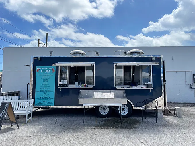 Independent Seafoods: A sleek blue food truck that promises seafood so fresh, you'll swear it jumped straight from the ocean to your plate.