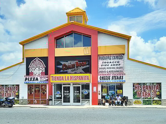 The colorful exterior of Laurel Junction beckons bargain hunters like a carnival of commerce waiting to be explored.