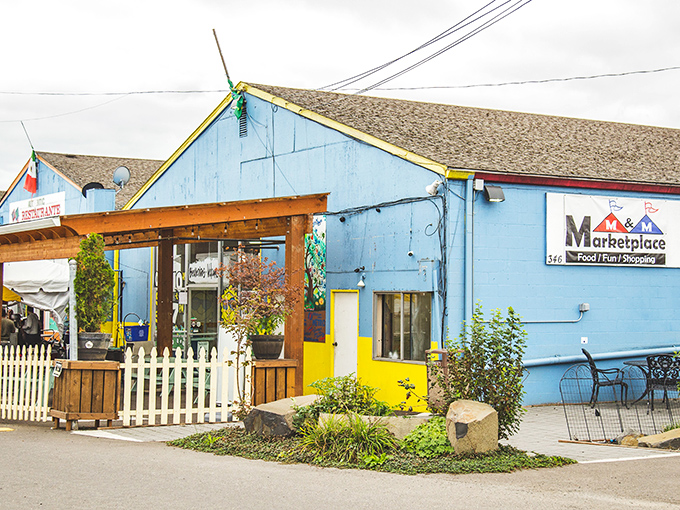 The blue facade of M&M Marketplace beckons like a colorful piñata ready to burst with treasures and bargains!