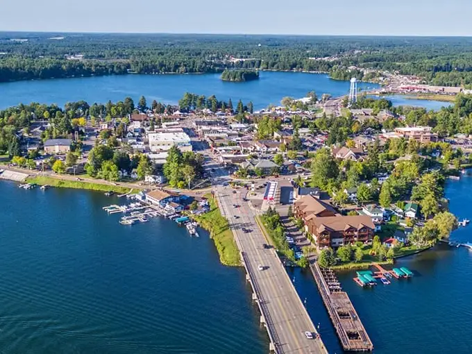 Minocqua's downtown stretches across the water like a Midwest Venice, minus the gondolas but with better cheese curds.