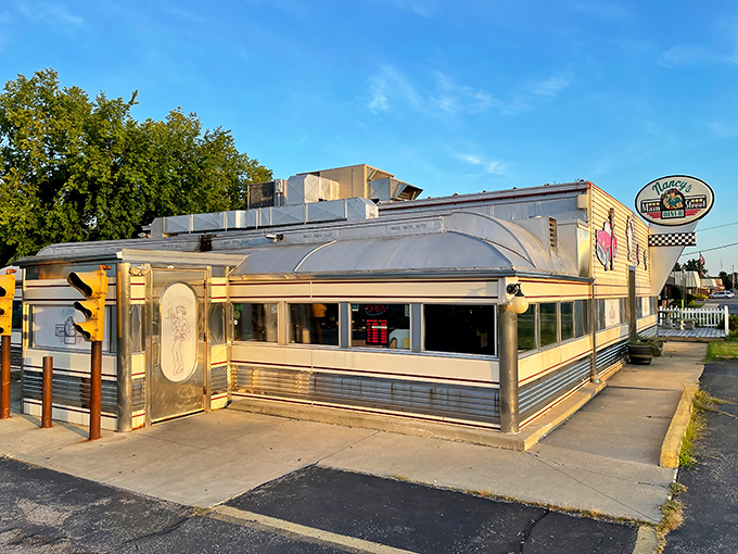 Classic Americana shines in this vintage diner's gleaming exterior. Like finding a time machine disguised as a breakfast spot!