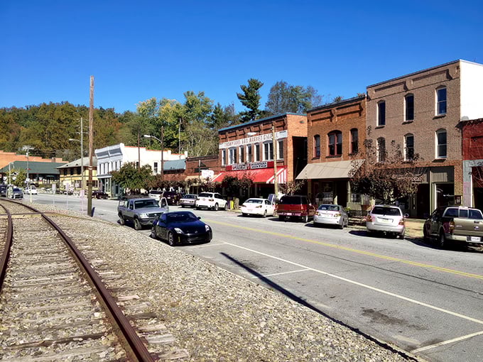 Railroad tracks running alongside brick storefronts – Saluda's way of saying "we've got history and we're not afraid to show it!"