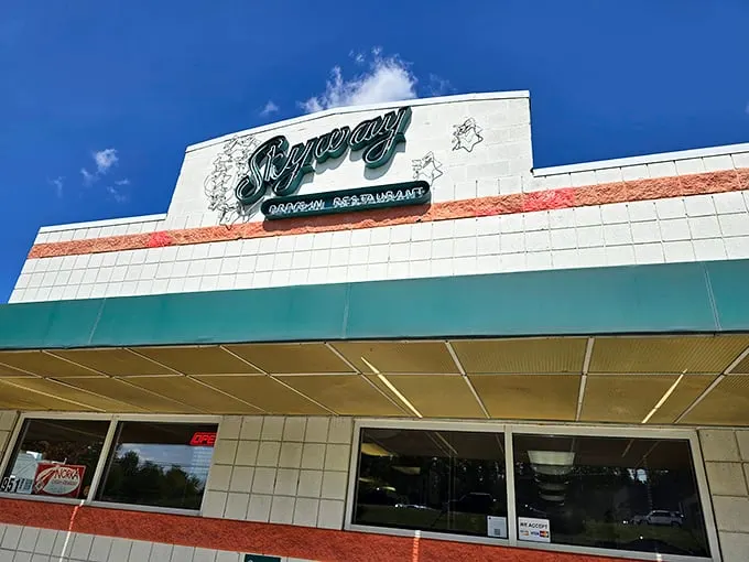The Skyway Drive-In's classic mint-green and white facade is like a portal to the 1950s. Pure nostalgic bliss!