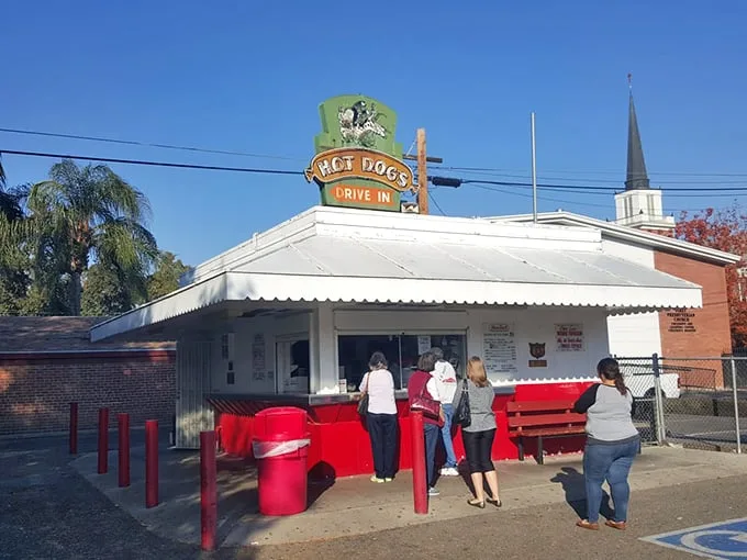 The iconic Taylor Bros. sign beckons hungry travelers like a lighthouse for hot dog lovers. Simple, classic, and absolutely worth the stop!