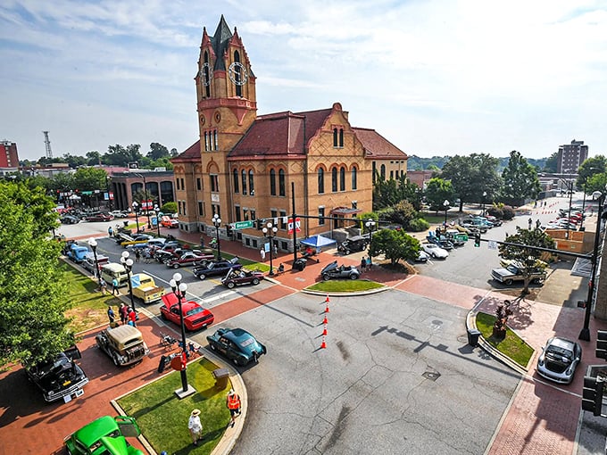"Classic cars gather around Anderson's grand courthouse like colorful beetles at a picnic. Small-town America showing off its Sunday best."