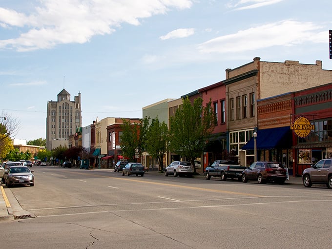 Red brick buildings stand proudly against mountain backdrops, offering small-town charm without the big-town price tag.