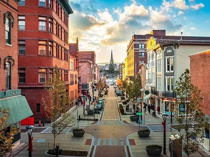 Sunset casts a golden glow on Cumberland's downtown, where historic buildings stand shoulder to shoulder like old friends catching up.