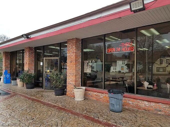 Brick facade, red trim, and donuts at all hours – Dom's isn't just a bakery, it's Ypsilanti's answer to "What if happiness had an address?"